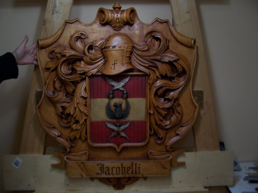 Staining carved family crest | Custom Wood Carving and Sculpting by ...